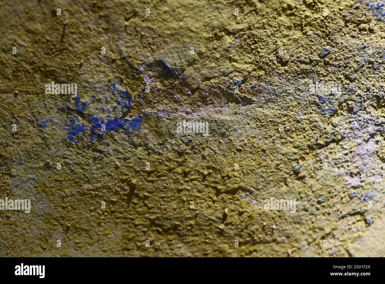 A visually striking textured surface that features captivating yellow ...