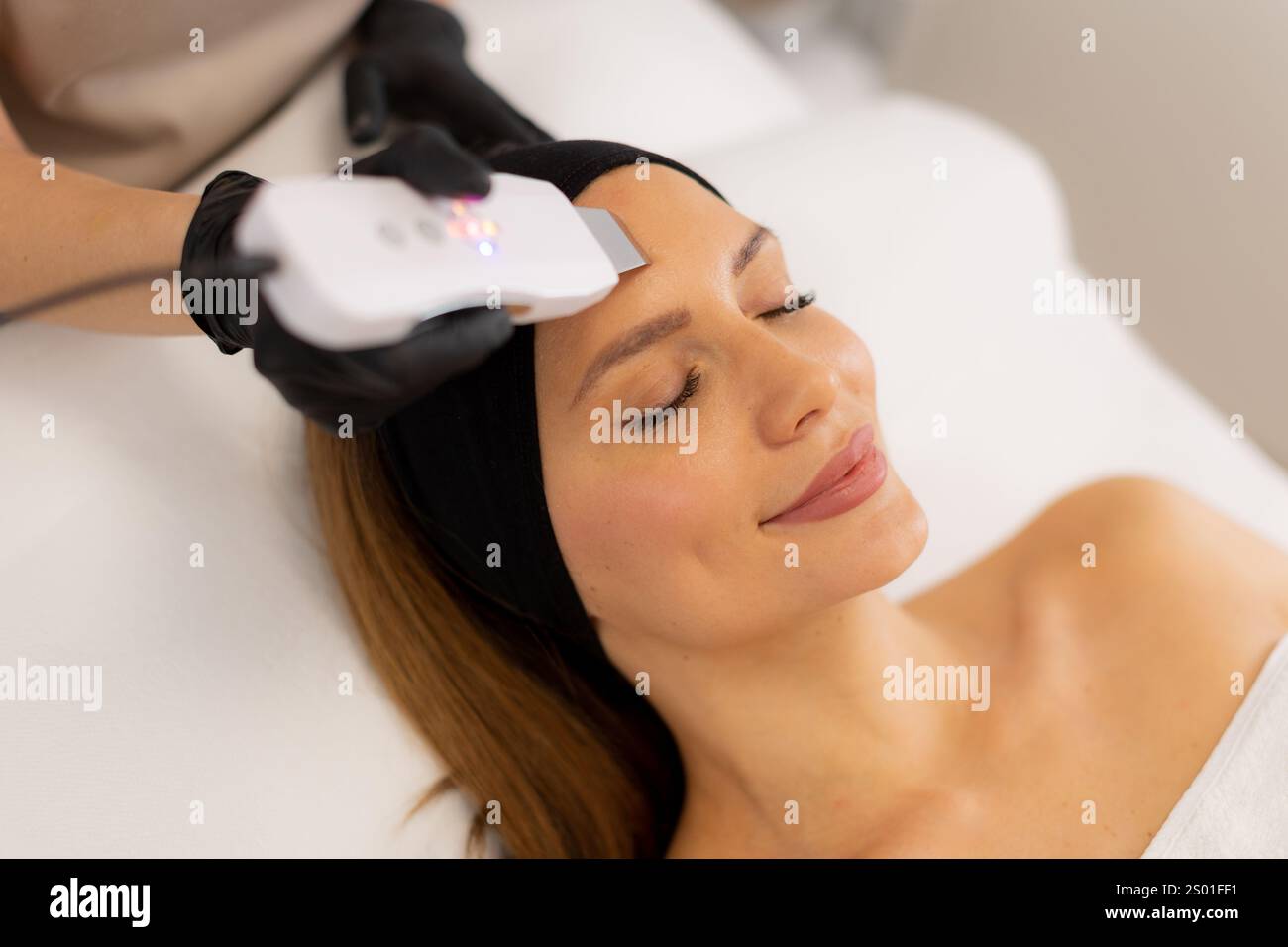 Soothing vibrations from the ultrasonic facial massager create a ...