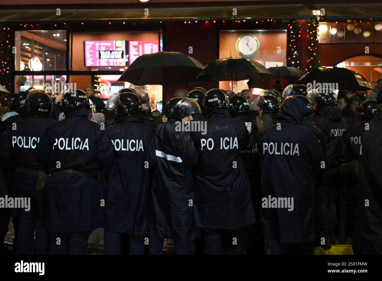 Police block opposition protesters during an anti-government rally ...