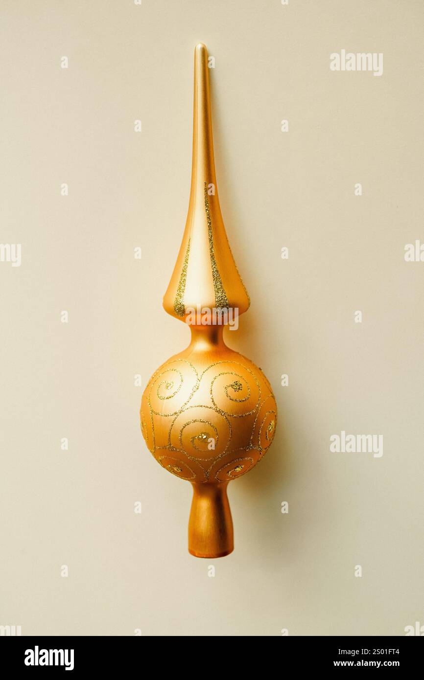 Sparkling Christmas gold Tree Topper, Christmas ornament Stock Photo ...