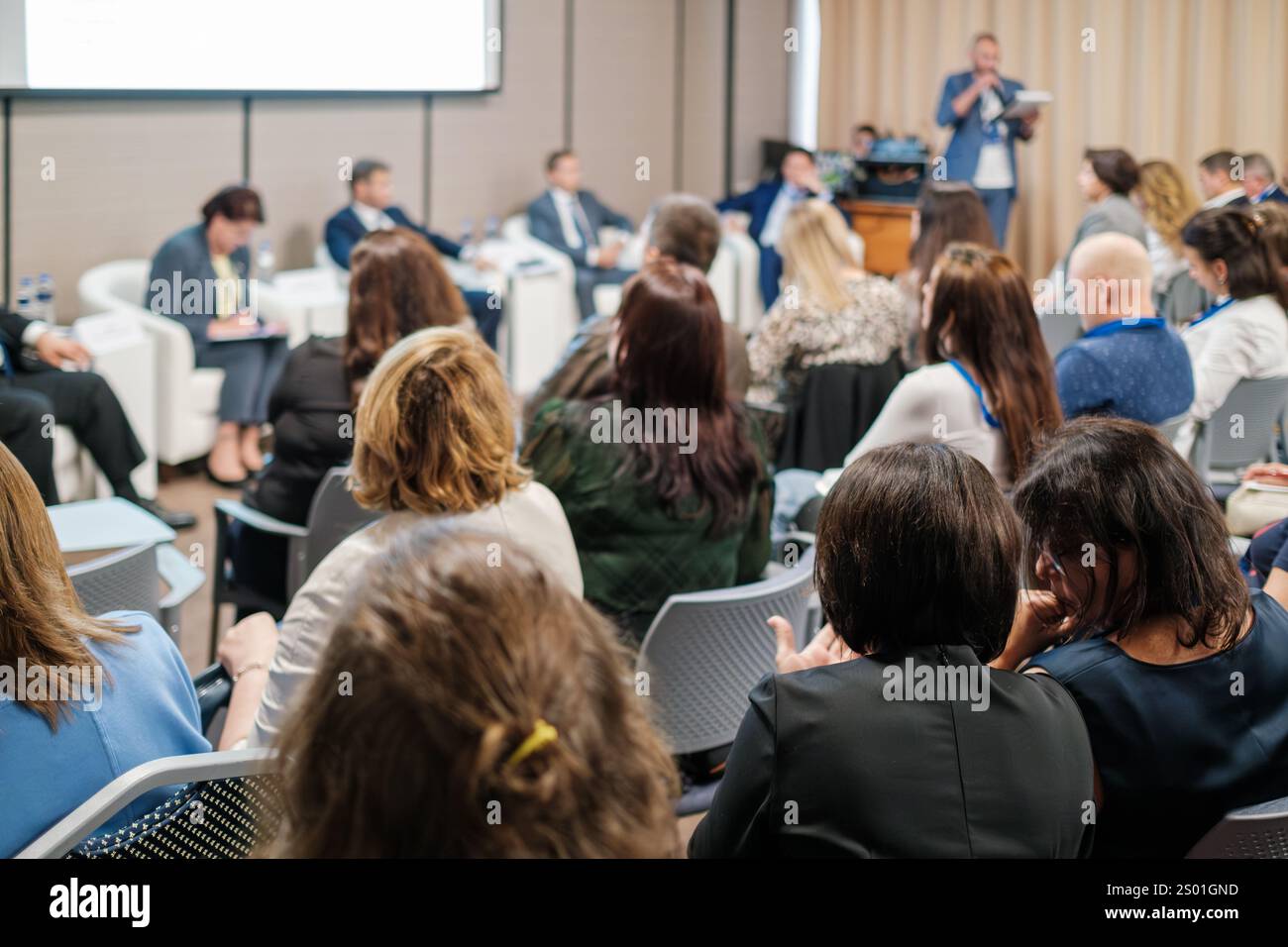 Large group of people gathered for a professional conference, engaging ...