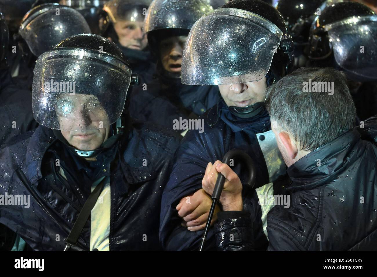 Police block opposition protesters during an anti-government rally ...
