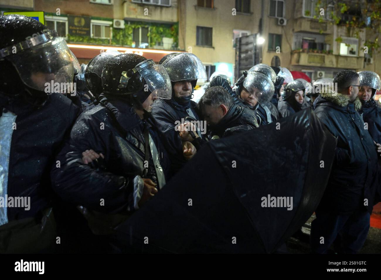 Police block opposition protesters during an anti-government rally ...