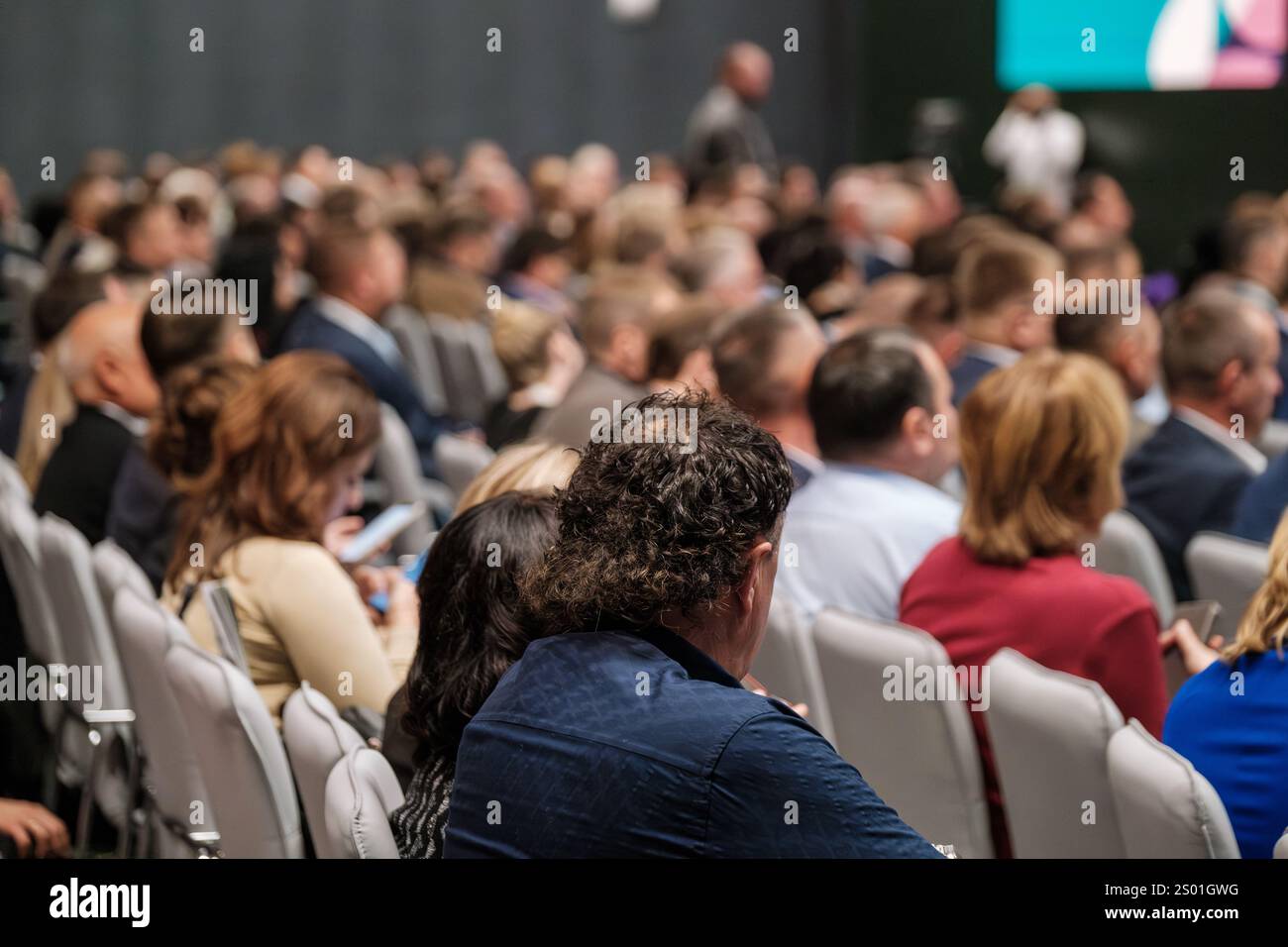 Attendees seated conference observing hi-res stock photography and ...