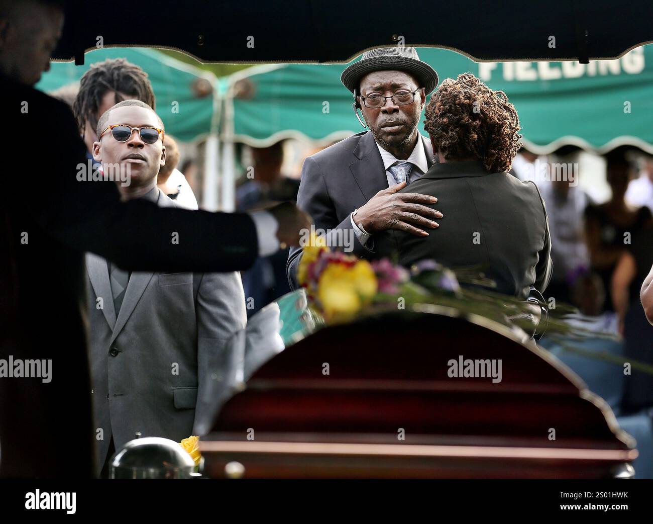 FILE - Tyrone Sanders and Felicia Sanders comfort each other at the ...