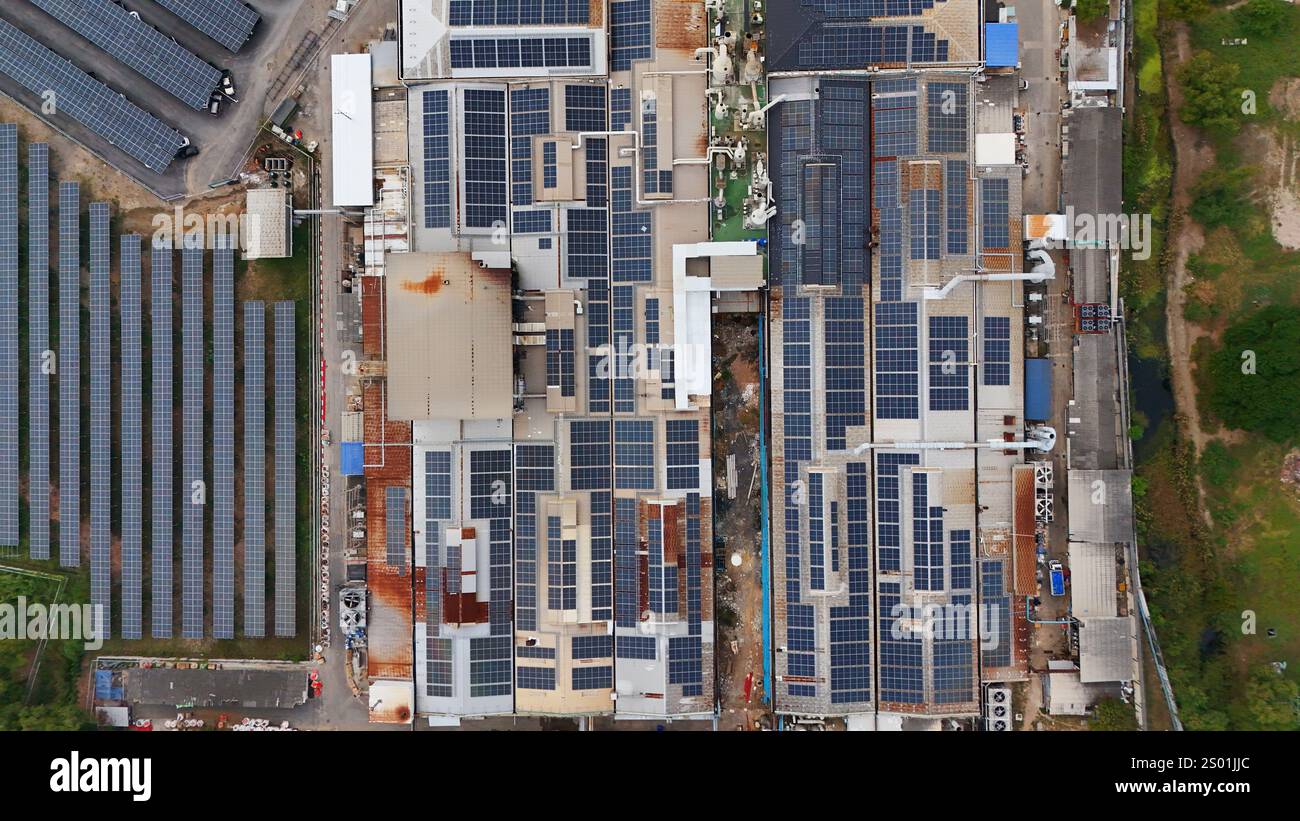 This aerial view showcases extensive solar panel installations on the ...