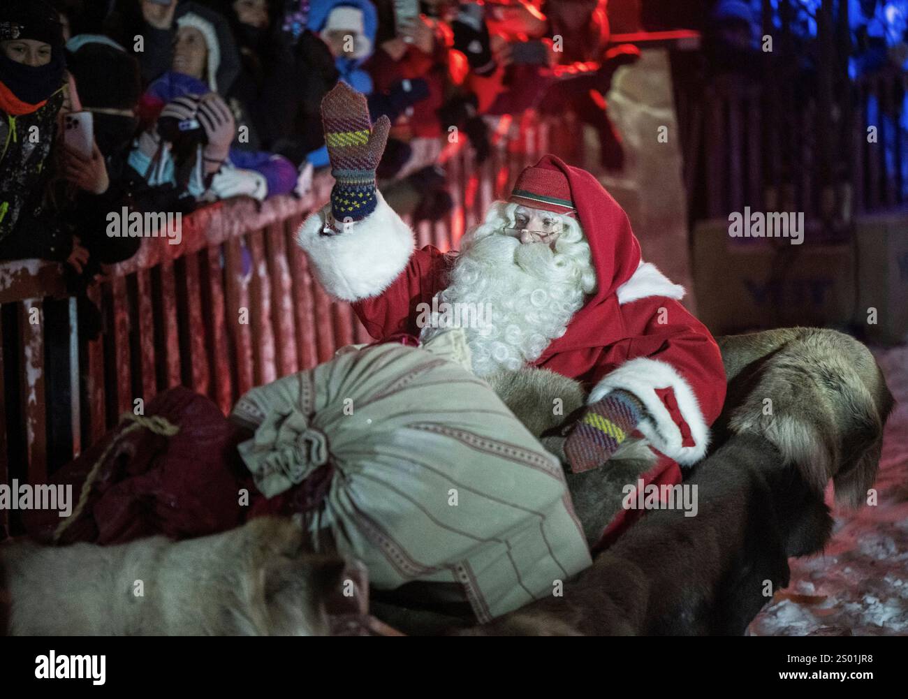Santa Claus, also known as Father Christmas, leaves to his long ...
