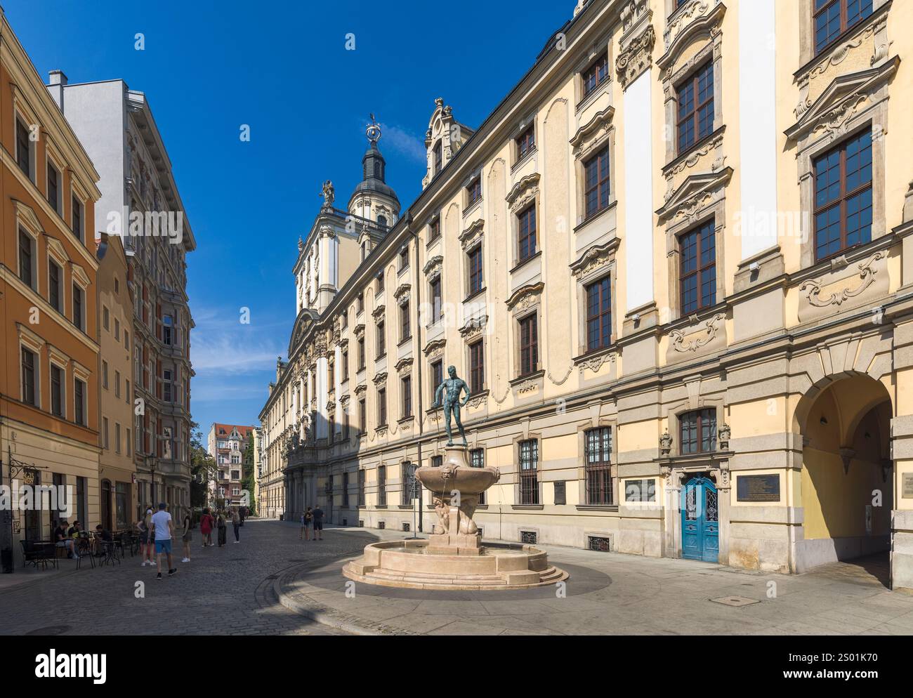 Visitors stroll the charming streets of Wroclaw's old town near the ...