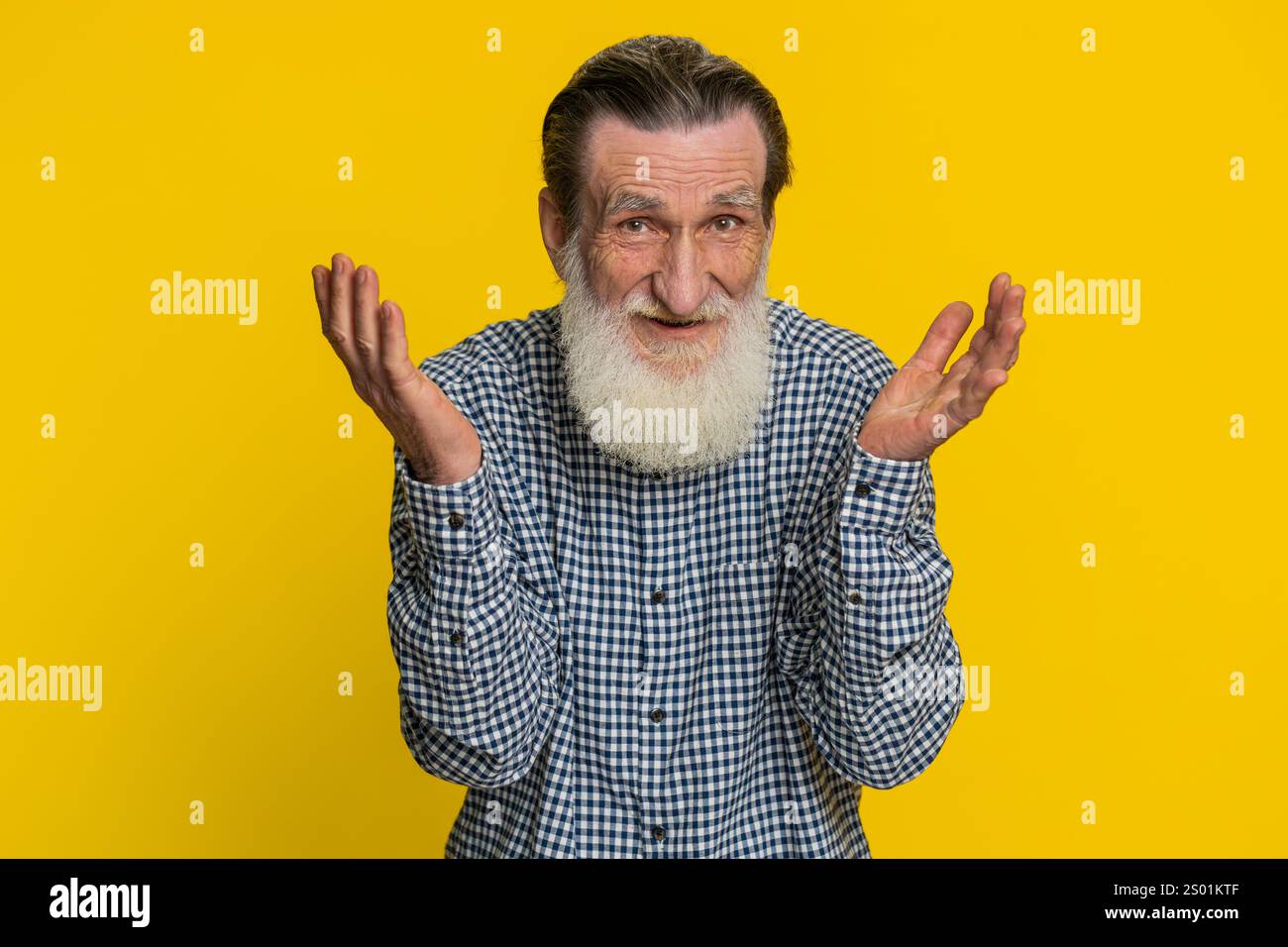 What. Why. Angry senior man raising hands in indignant expression ...