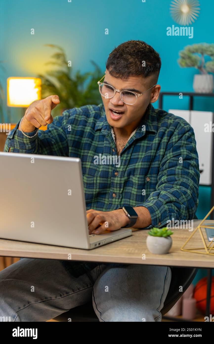 Quarrel. Furious annoyed businessman freelancer engage in heated laptop ...