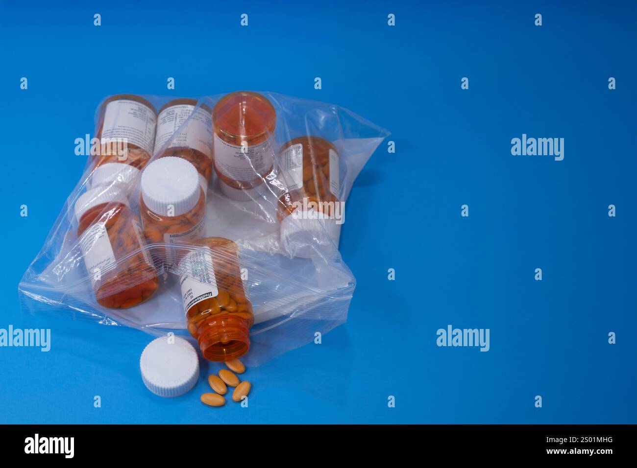 A plastic bag containing multiple bottles for a prescription Stock ...