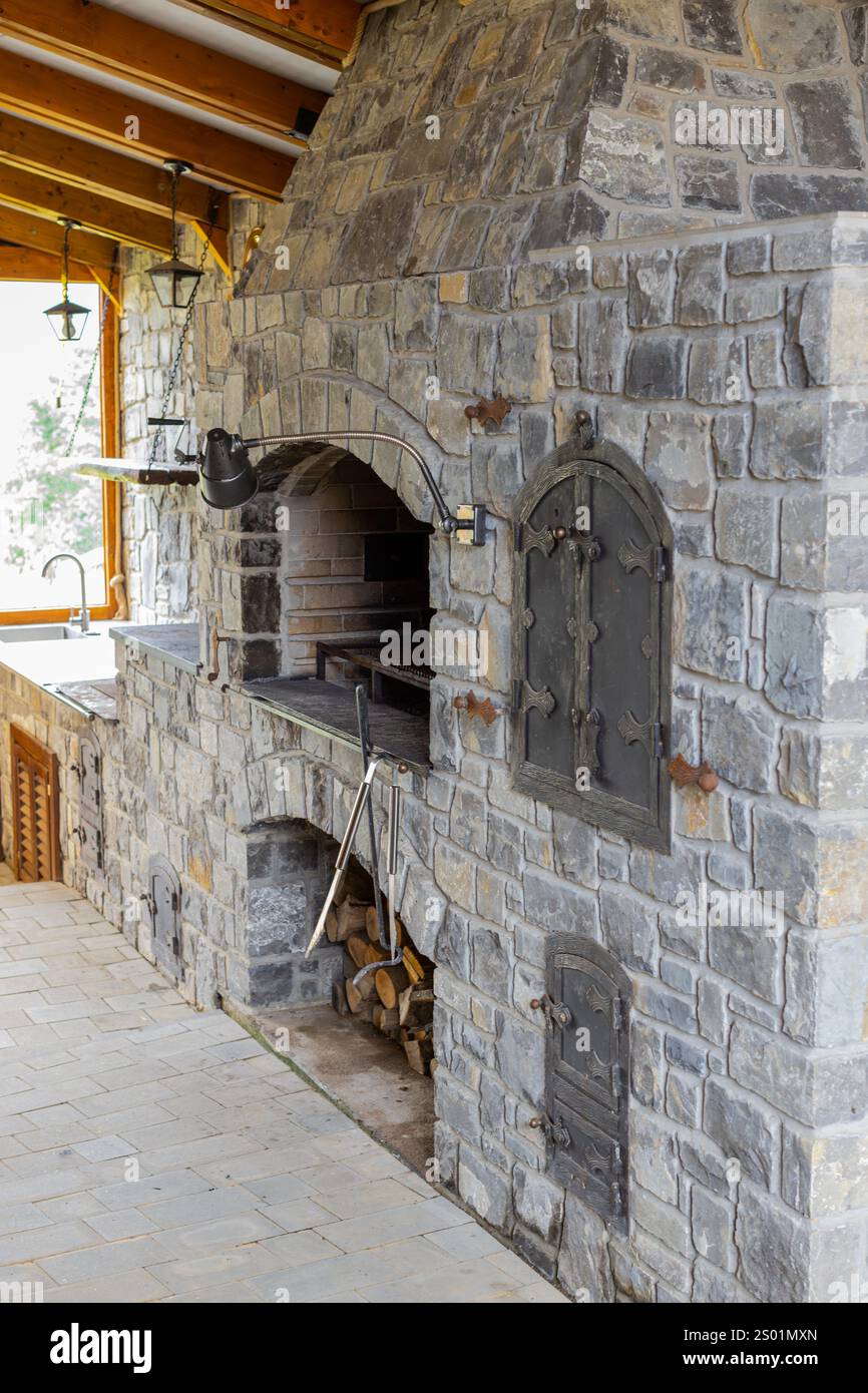 Stone barbecue firewood, open brick oven for cooking kebabs and other ...