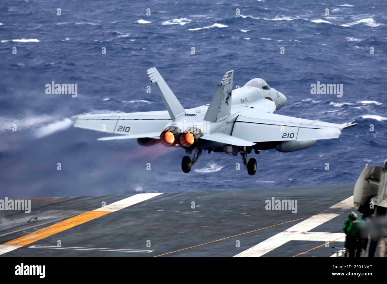 PHILIPPINE SEA (Dec. 20, 2024) – An F/A-18E Super Hornet, assigned to ...