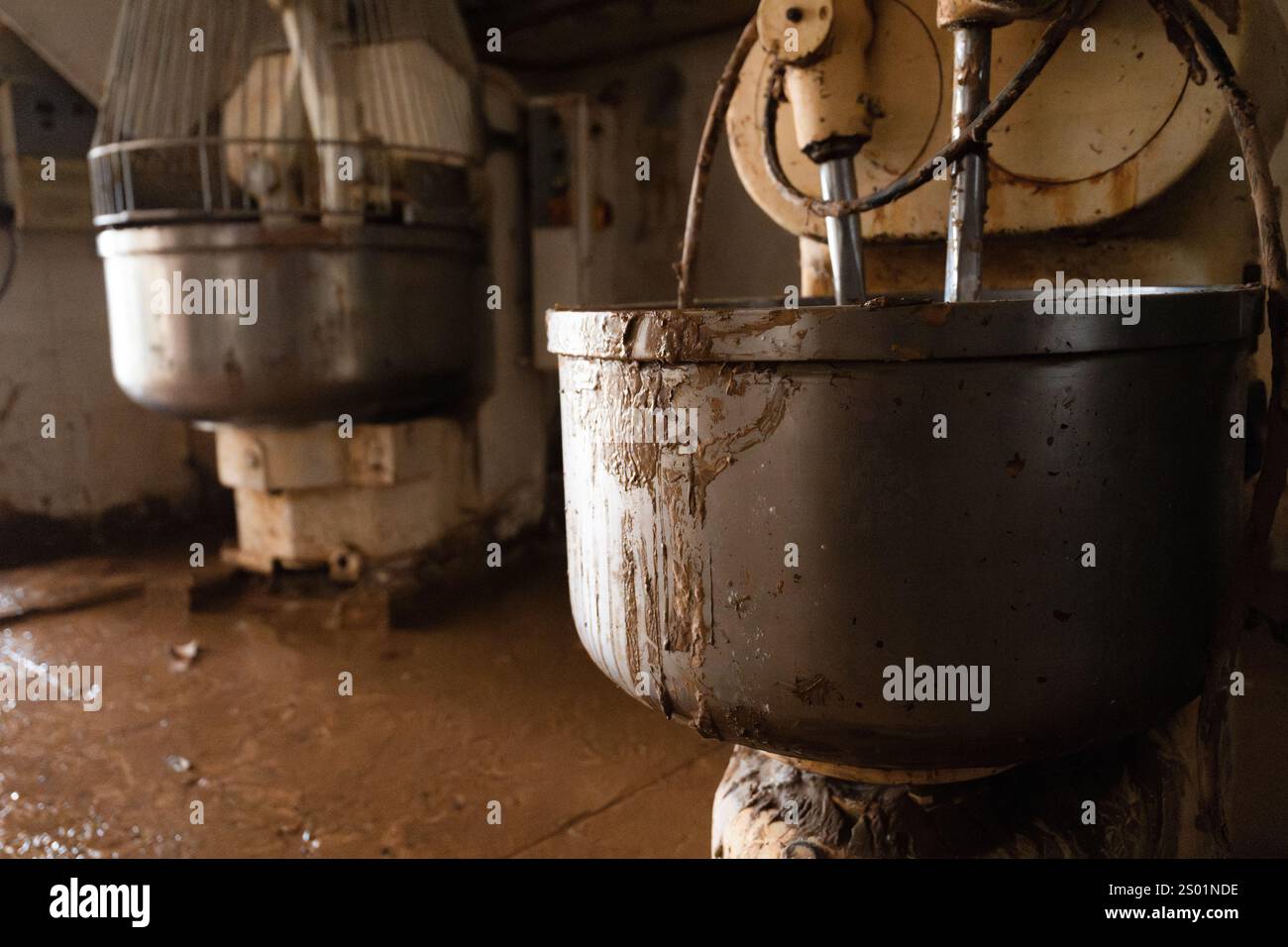 DANA flooding effects. Flood impacts, Valencia, Spain. Bread kneaders ...