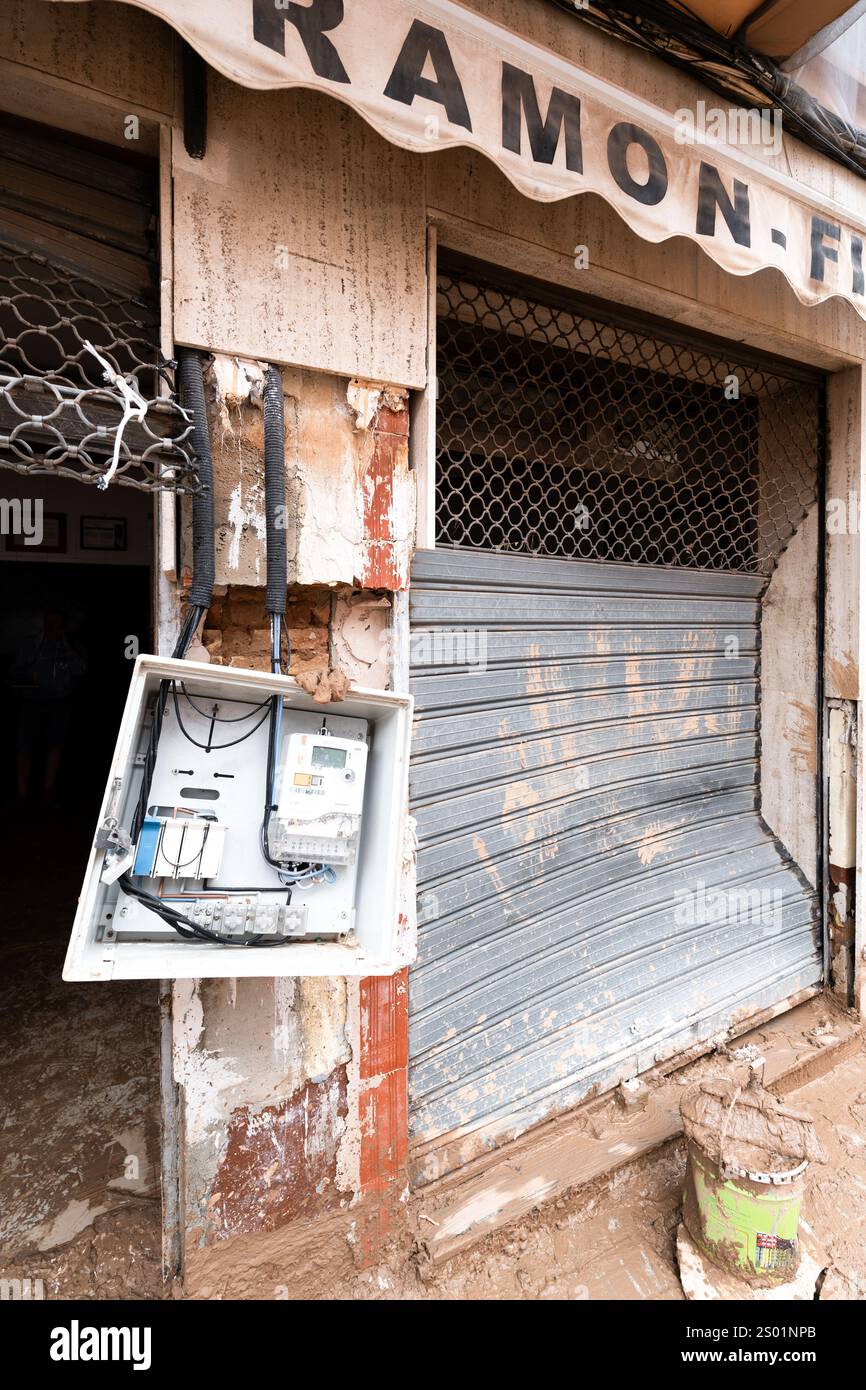 DANA flooding effects. Flood impacts, Valencia, Spain. Commerce shop ...
