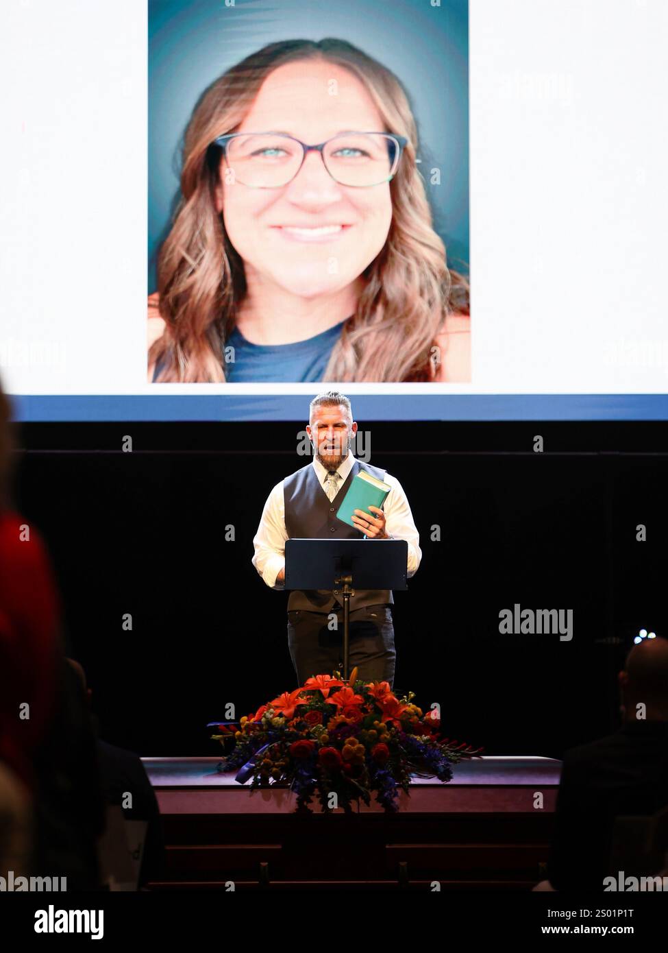 DOXA Church Lead Pastor Rob Warren holds Erin Michelle West's personal ...