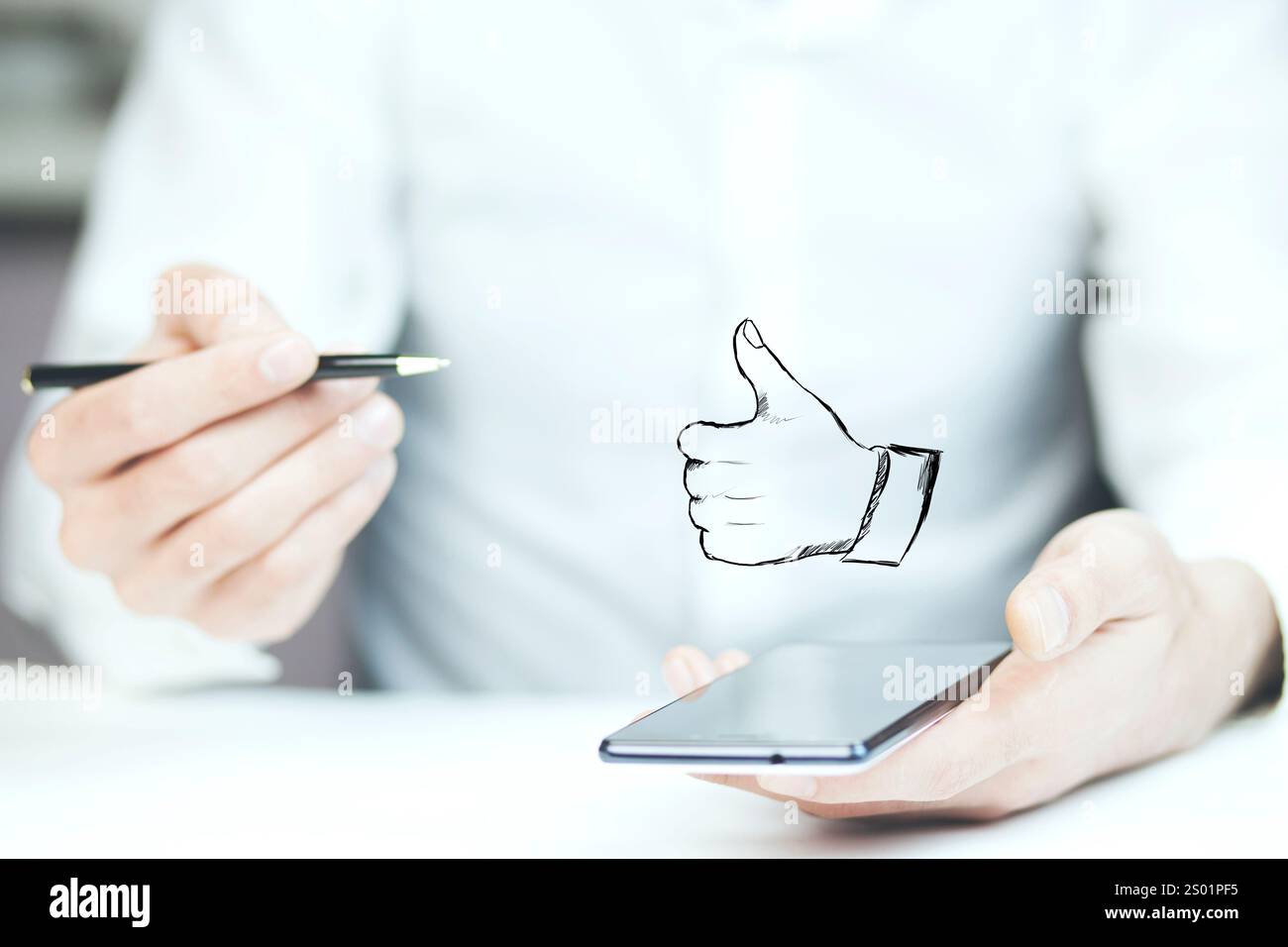 Man palm opening showing thumb up on phone Stock Photo - Alamy