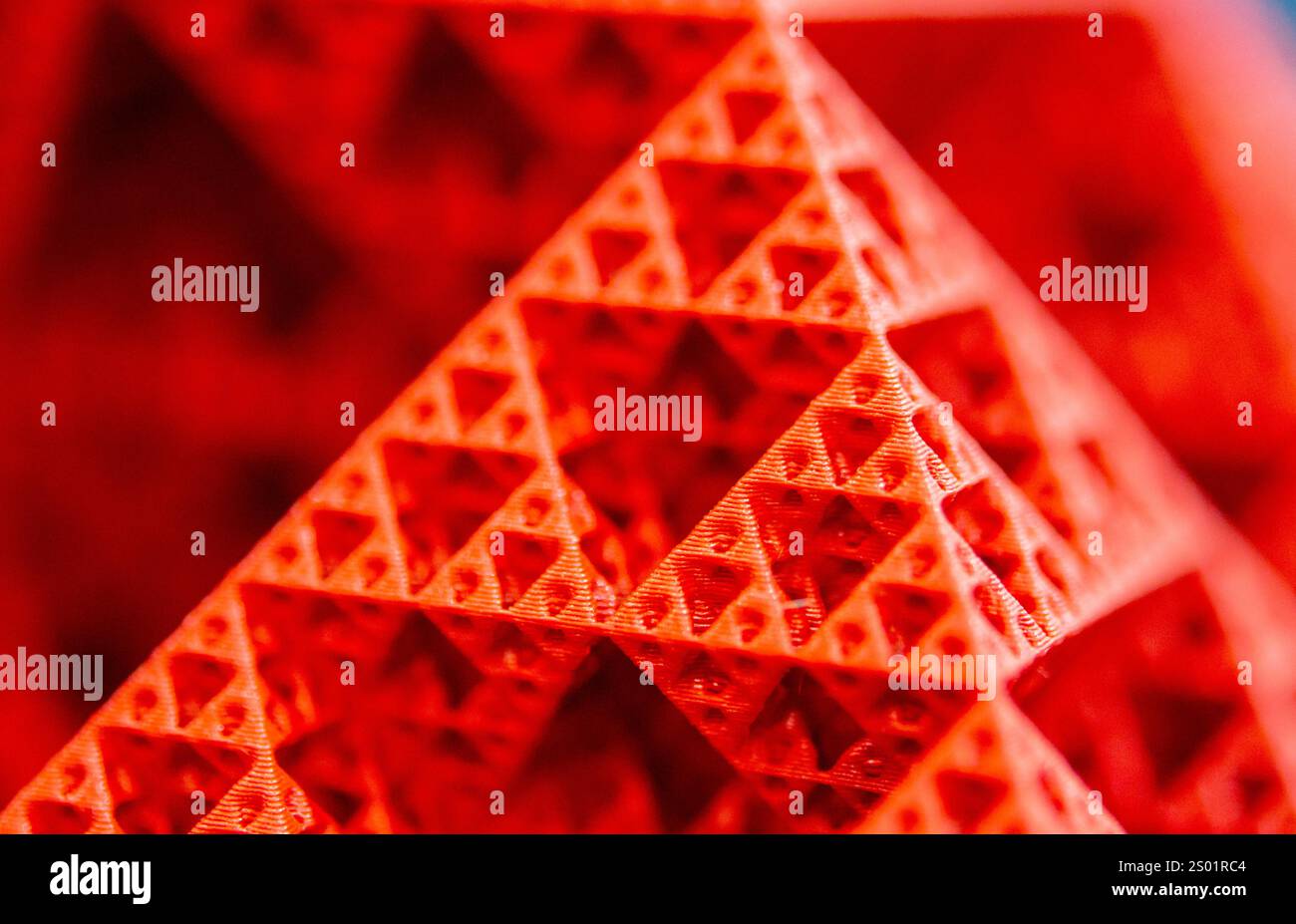 Art object printed on 3D printer from red melted plastic close-up ...