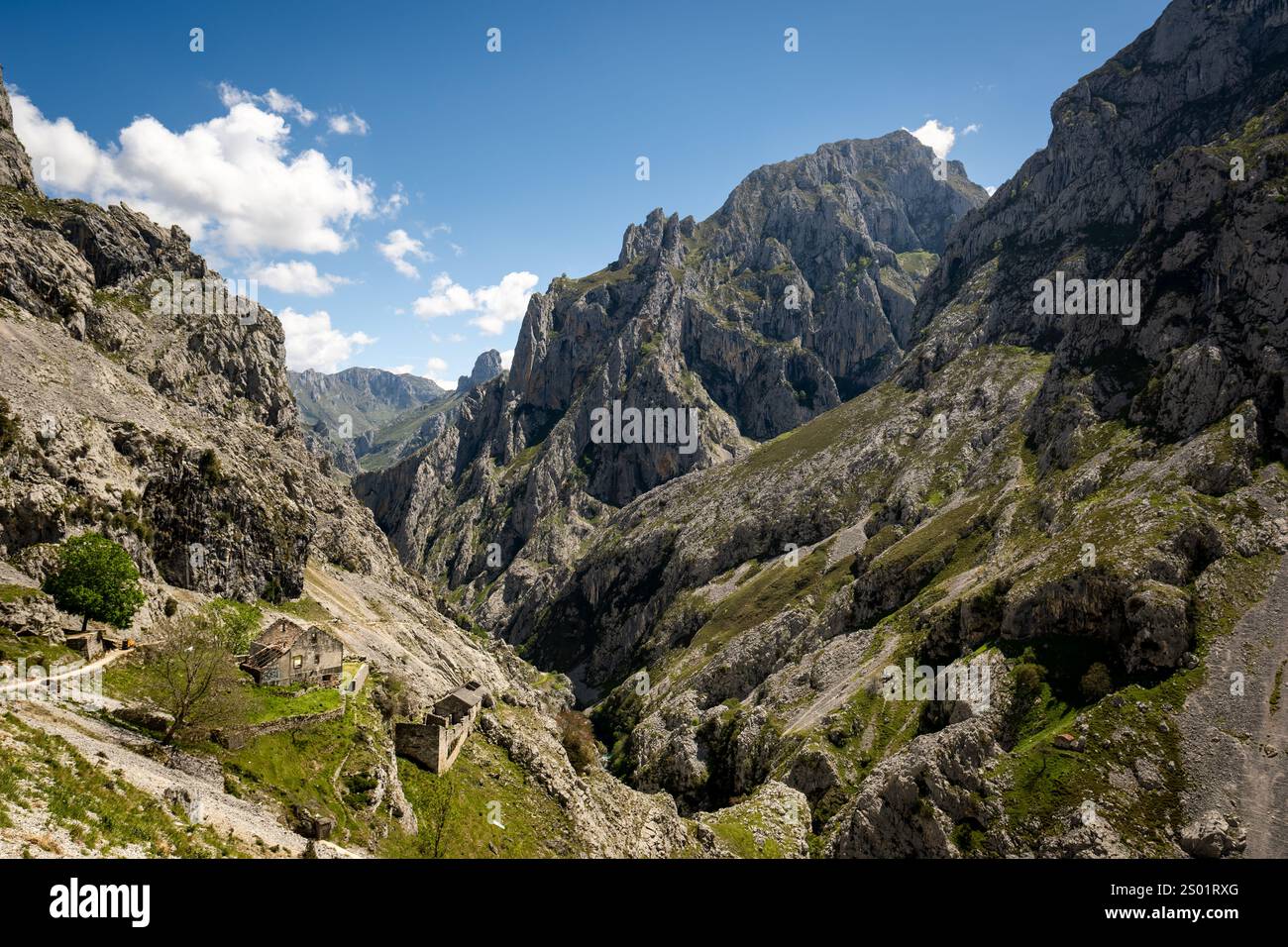 Cares route hiking trail crossing a valley between steep rocky ...