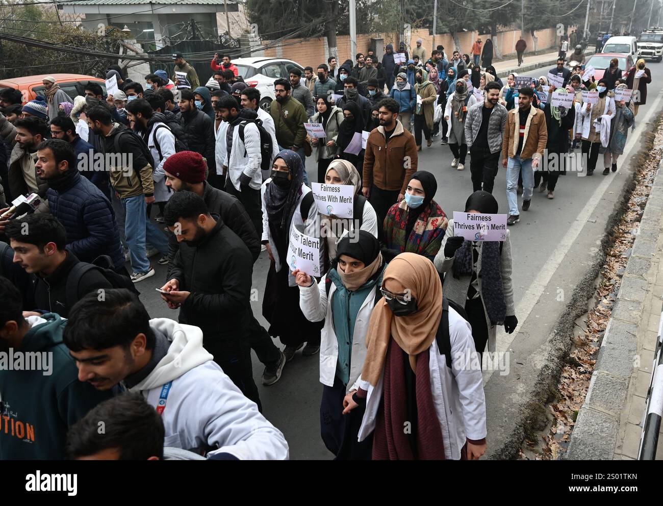 SRINAGAR, INDIA - DECEMBER 23: Students take part in a protest outside ...