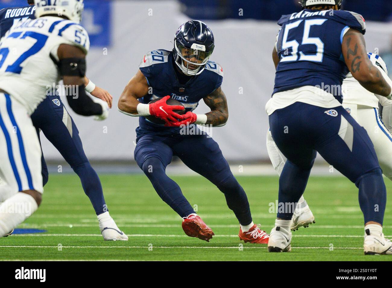 Tennessee Titans running back Tony Pollard (20) runs up the middle ...