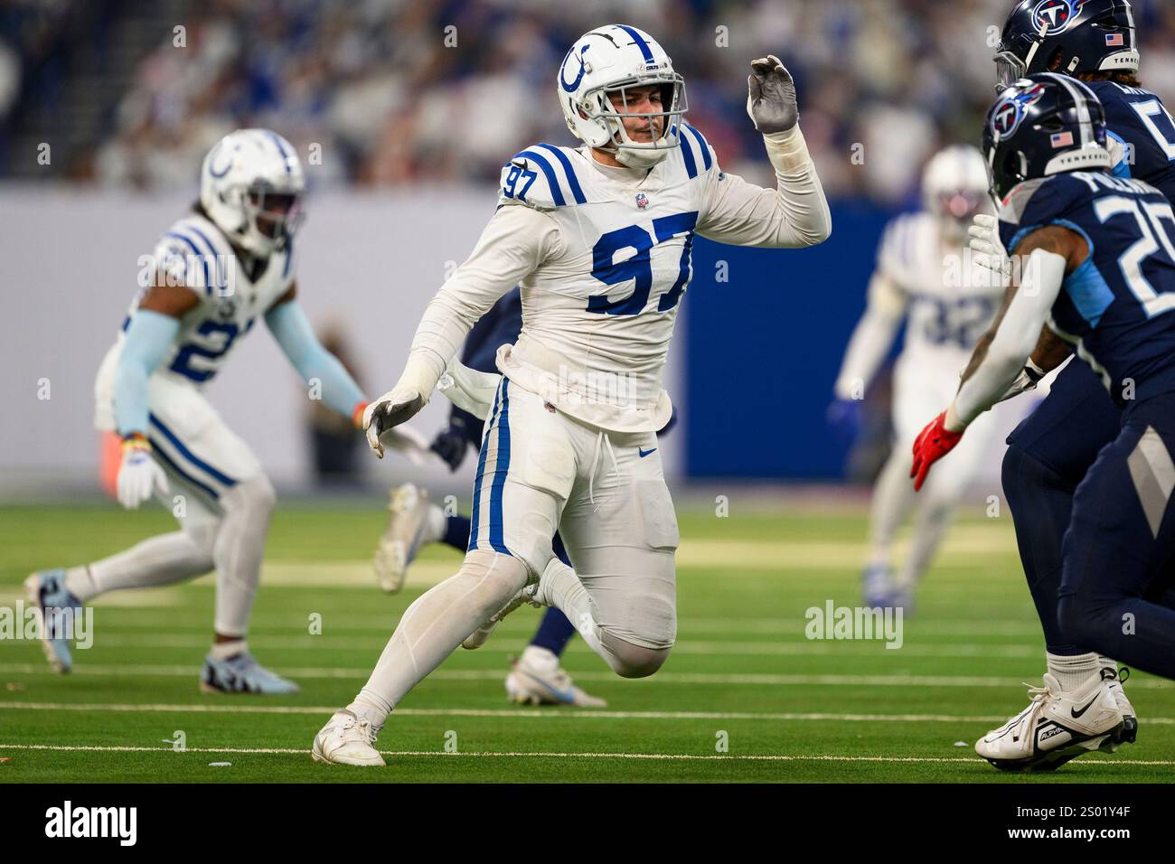 Indianapolis Colts defensive end Laiatu Latu (97) rushes around the ...