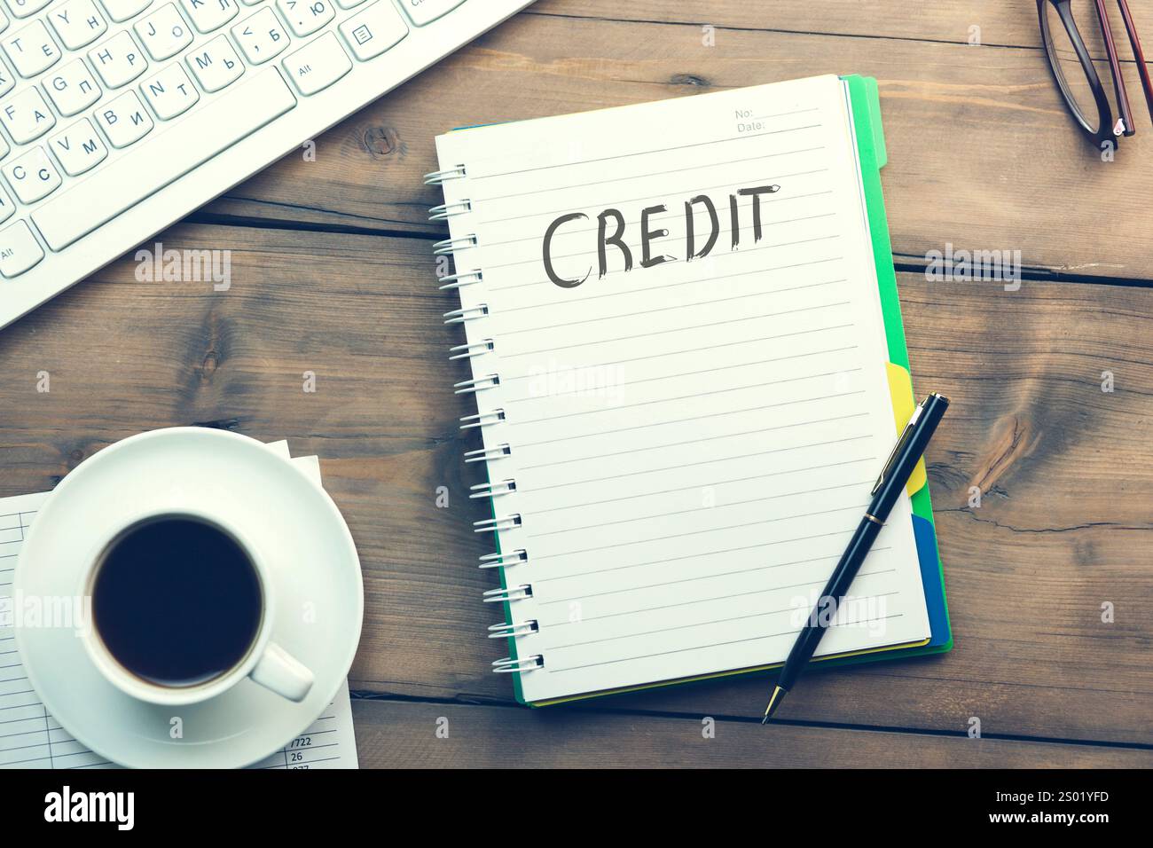 Credit text written on a notebook with keyboard Stock Photo - Alamy