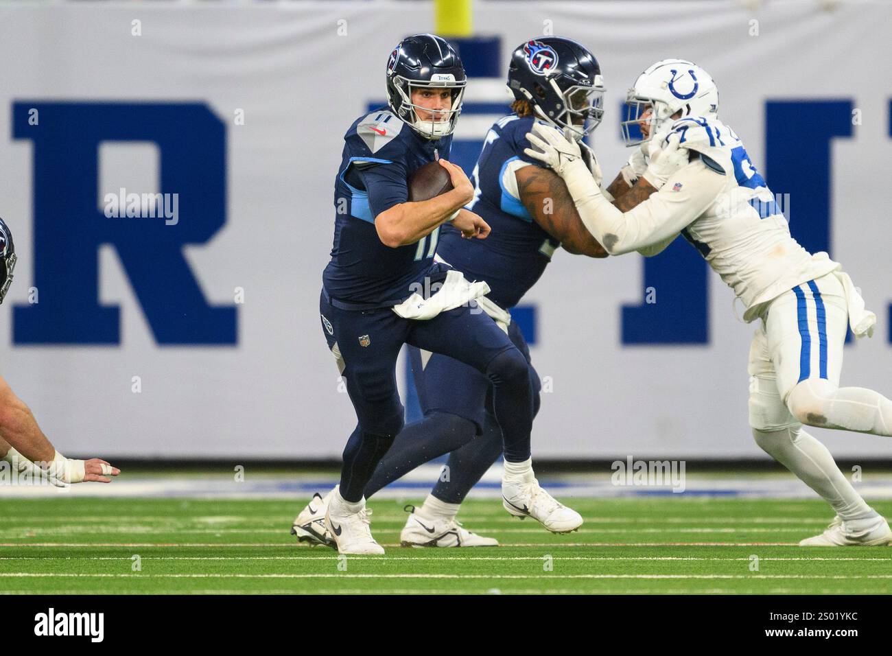Tennessee Titans quarterback Mason Rudolph (11) runs down the field ...