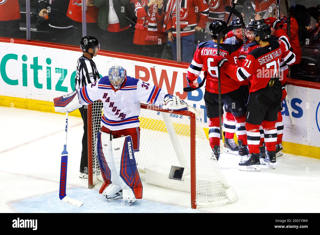 New York Rangers goaltender Jonathan Quick (32) reacts after a goal by ...
