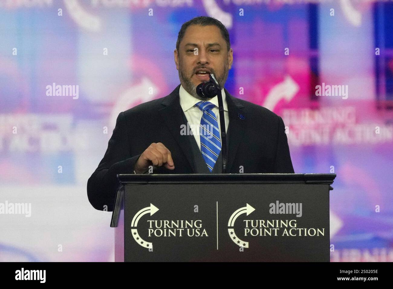 Border Patrol agent Paul Perez speaks at AmericaFest, Sunday, Dec. 22, 2024, in Phoenix. (AP ...