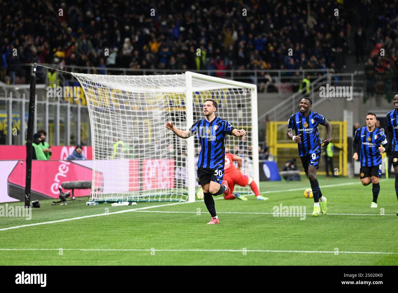 Milan, Italy. 23rd Dec, 2024. Carlos Augusto (inter) celebrating his ...