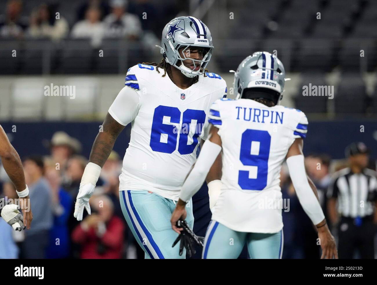 Dallas Cowboys offensive tackle Tyler Guyton (60) and wide receiver ...