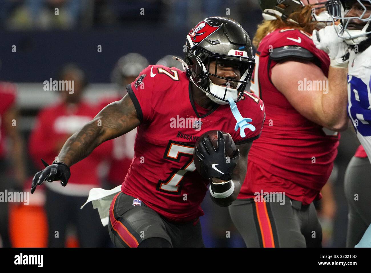 Tampa Bay Buccaneers running back Bucky Irving carries the ball on a ...