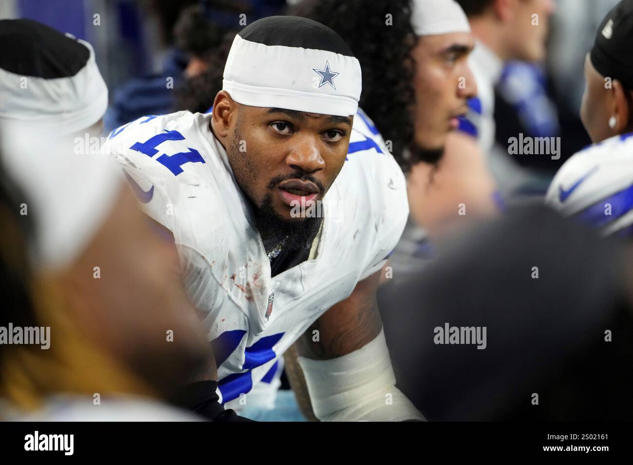 Dallas Cowboys linebacker Micah Parsons talks to teammates on the ...
