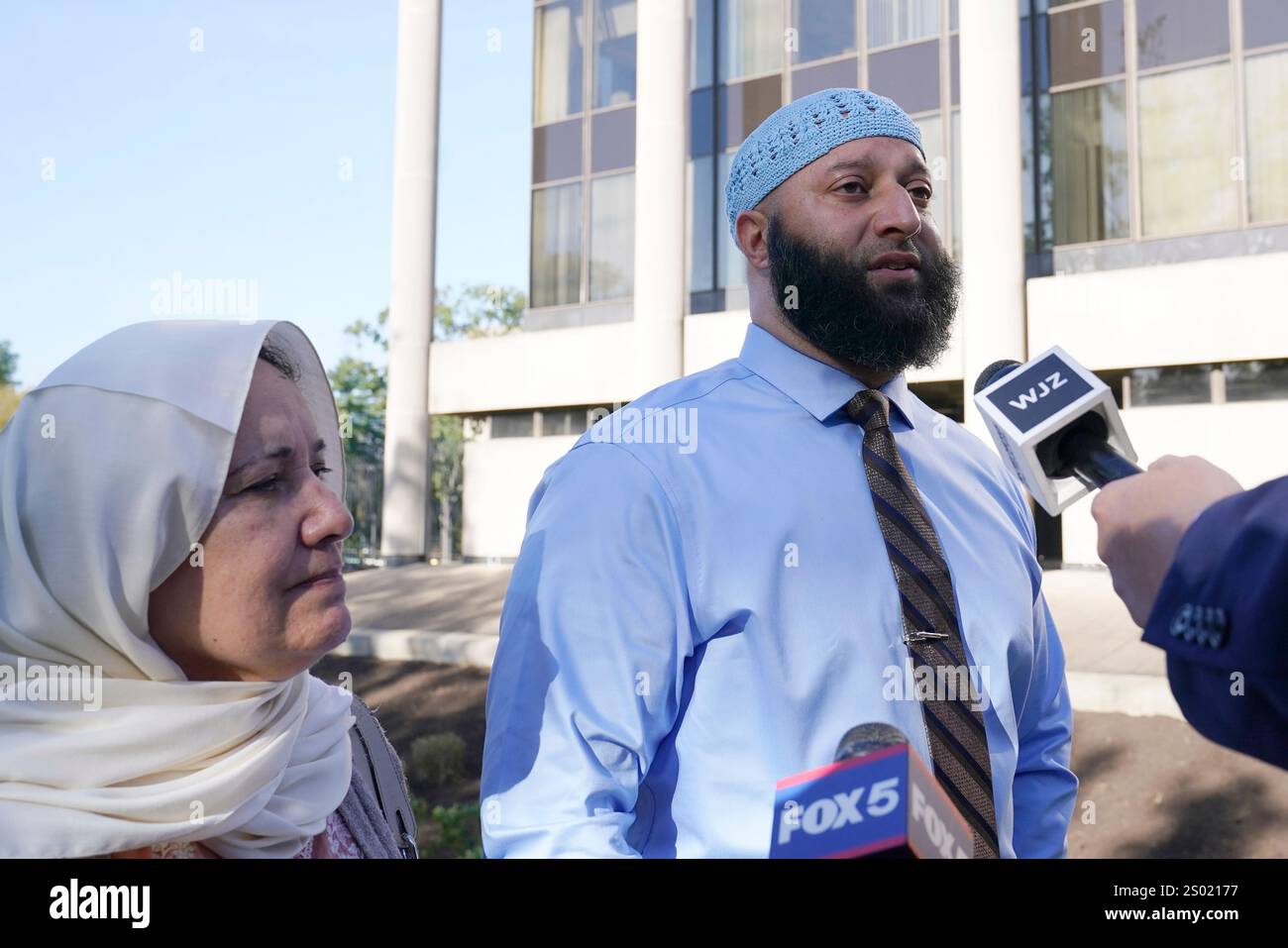 FILE - Adnan Syed and his mother, Shamim Rahman, talk with reporters as ...