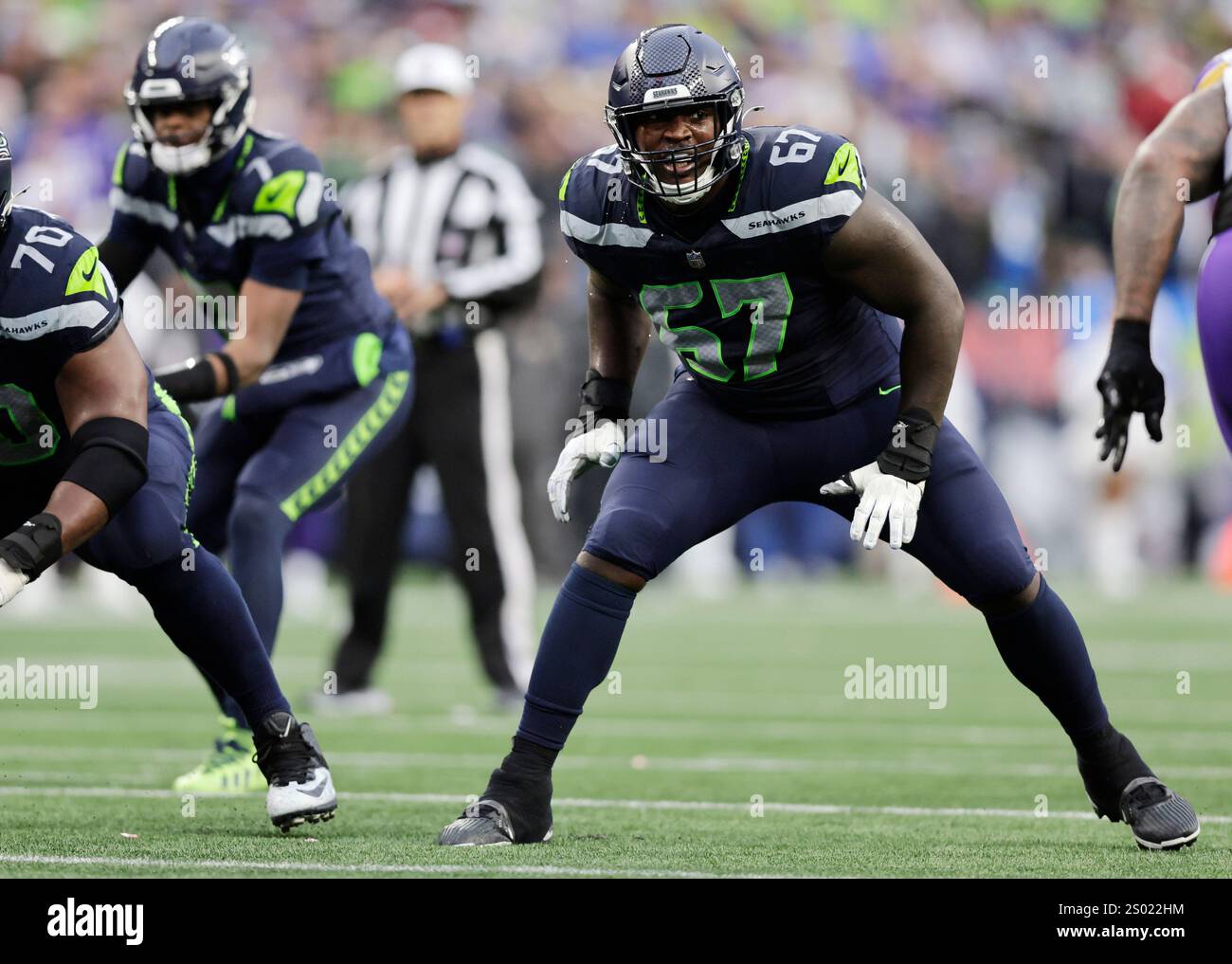 Seattle Seahawks offensive tackle Charles Cross (67) lines up for the ...