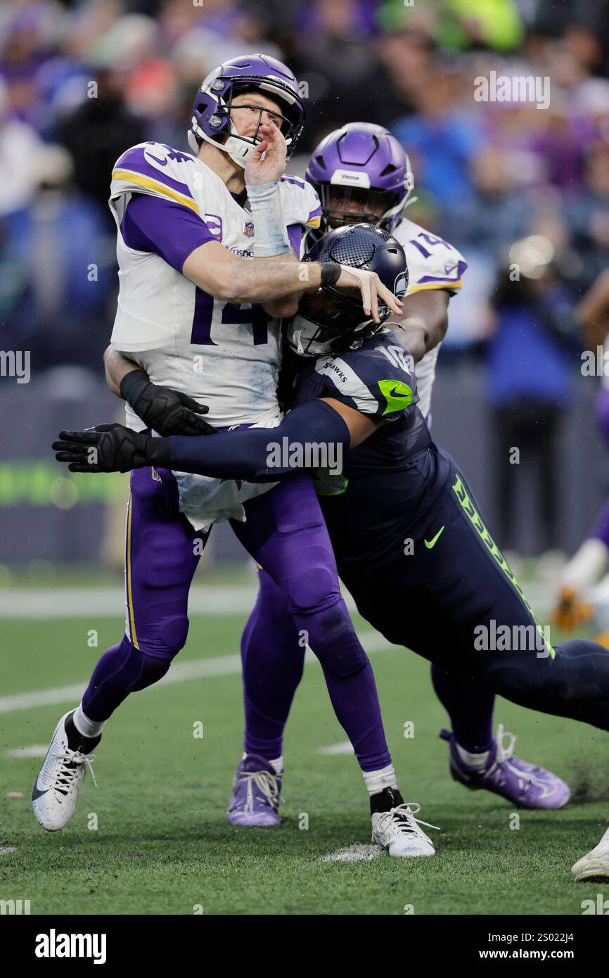 Seattle Seahawks linebacker Uchenna Nwosu (10) hits Minnesota Vikings ...
