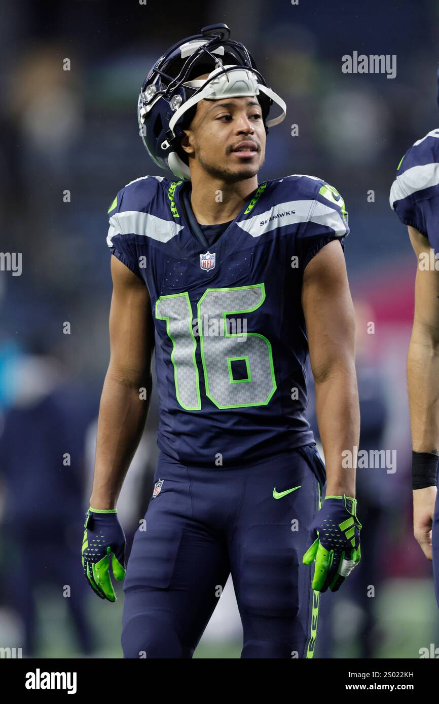 Seattle Seahawks wide receiver Tyler Lockett (16) walks off the field ...