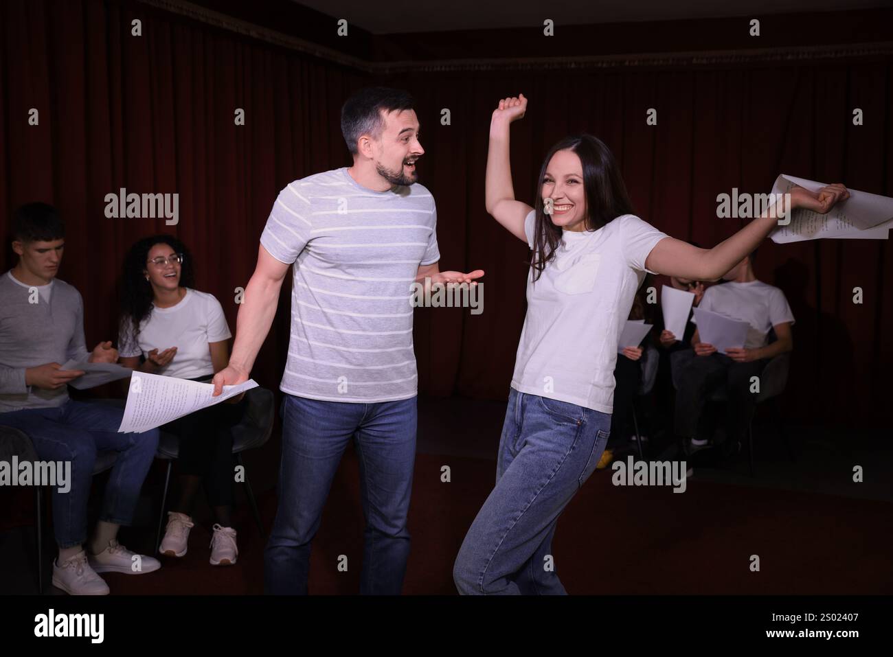 Professional actors rehearsing on stage in theatre Stock Photo - Alamy