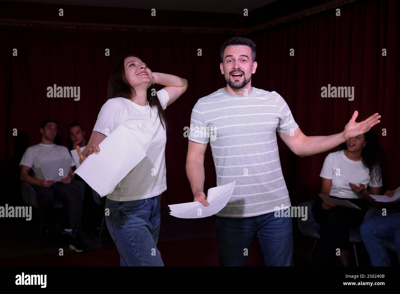 Professional actors rehearsing on stage in theatre Stock Photo - Alamy