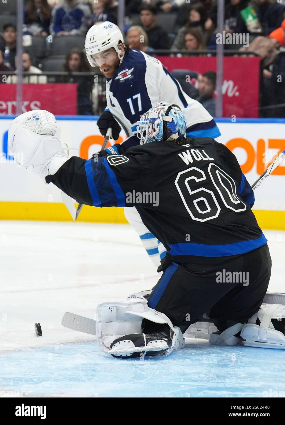 Toronto Maple Leafs goaltender Joseph Woll (60) makes a save against ...