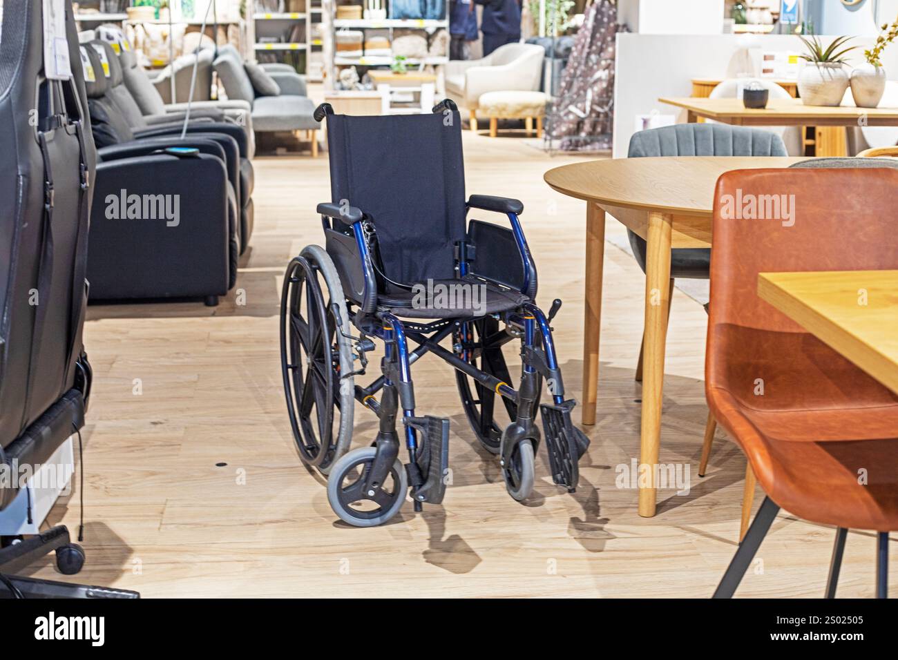 wheelchair for people with limited mobility in a supermarket ...