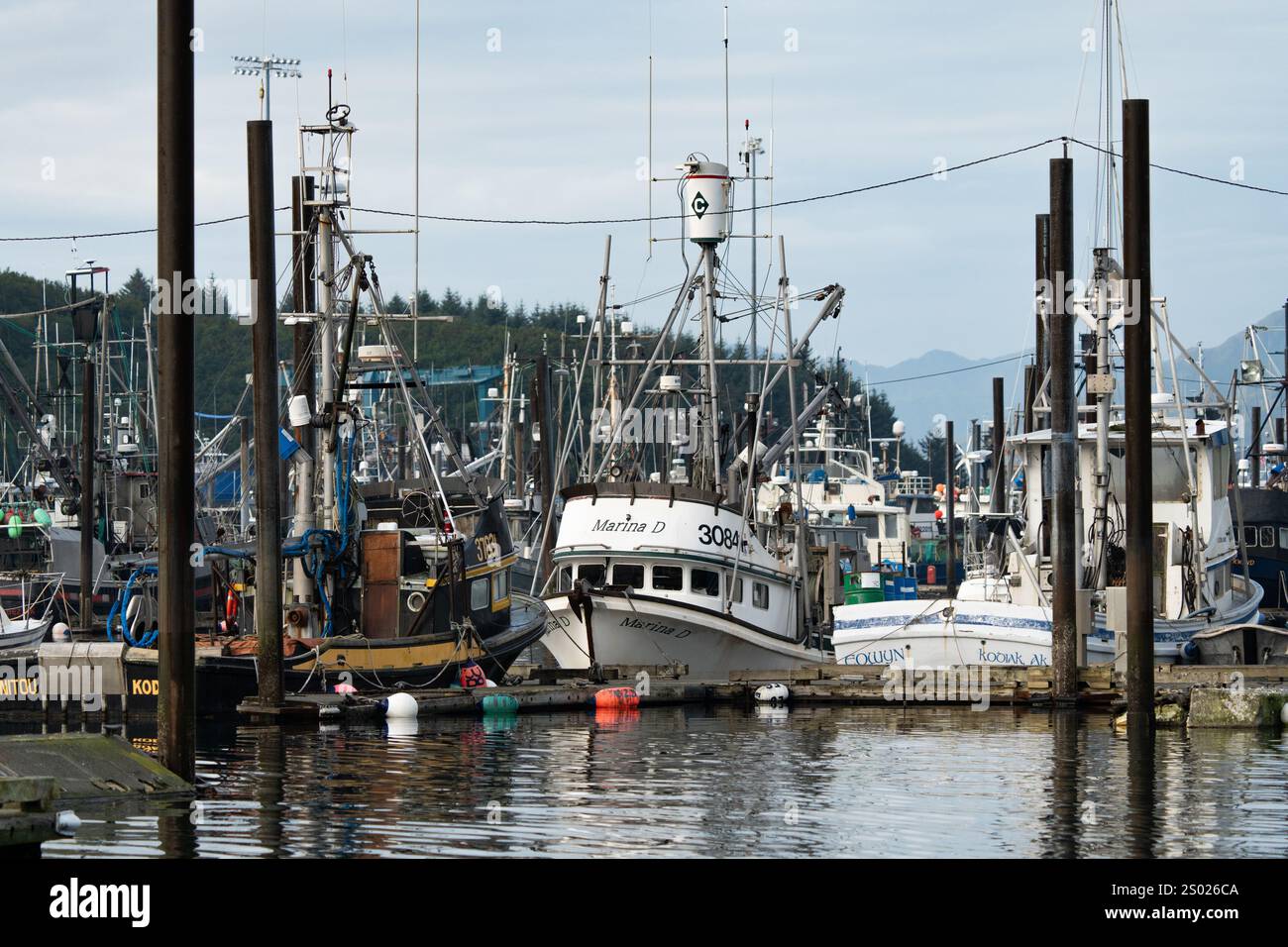 Many different types of boats occupy the harbor in Kodiak, Alaska ...