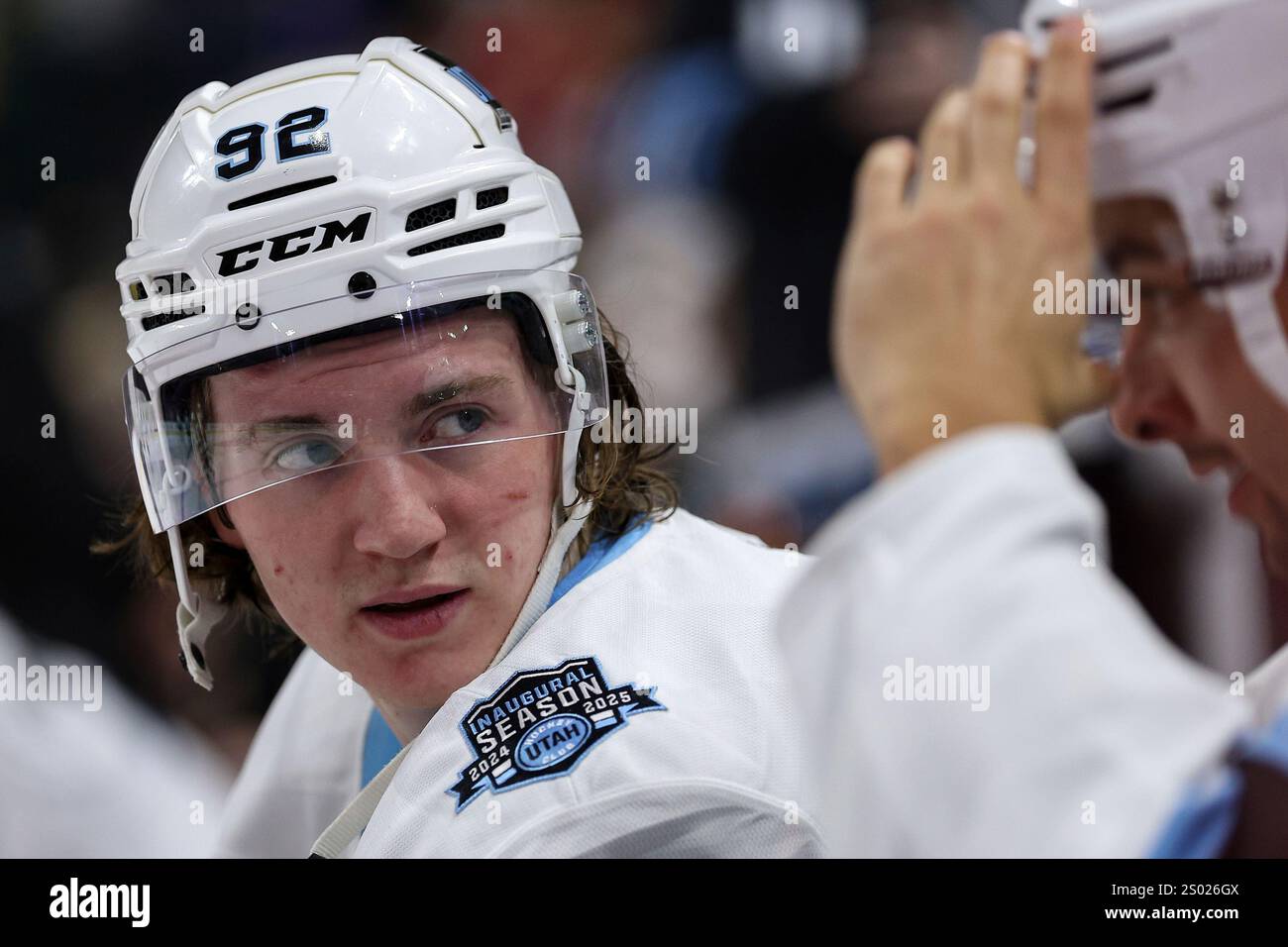 Utah Hockey Club center Logan Cooley (92) looks on during the third ...
