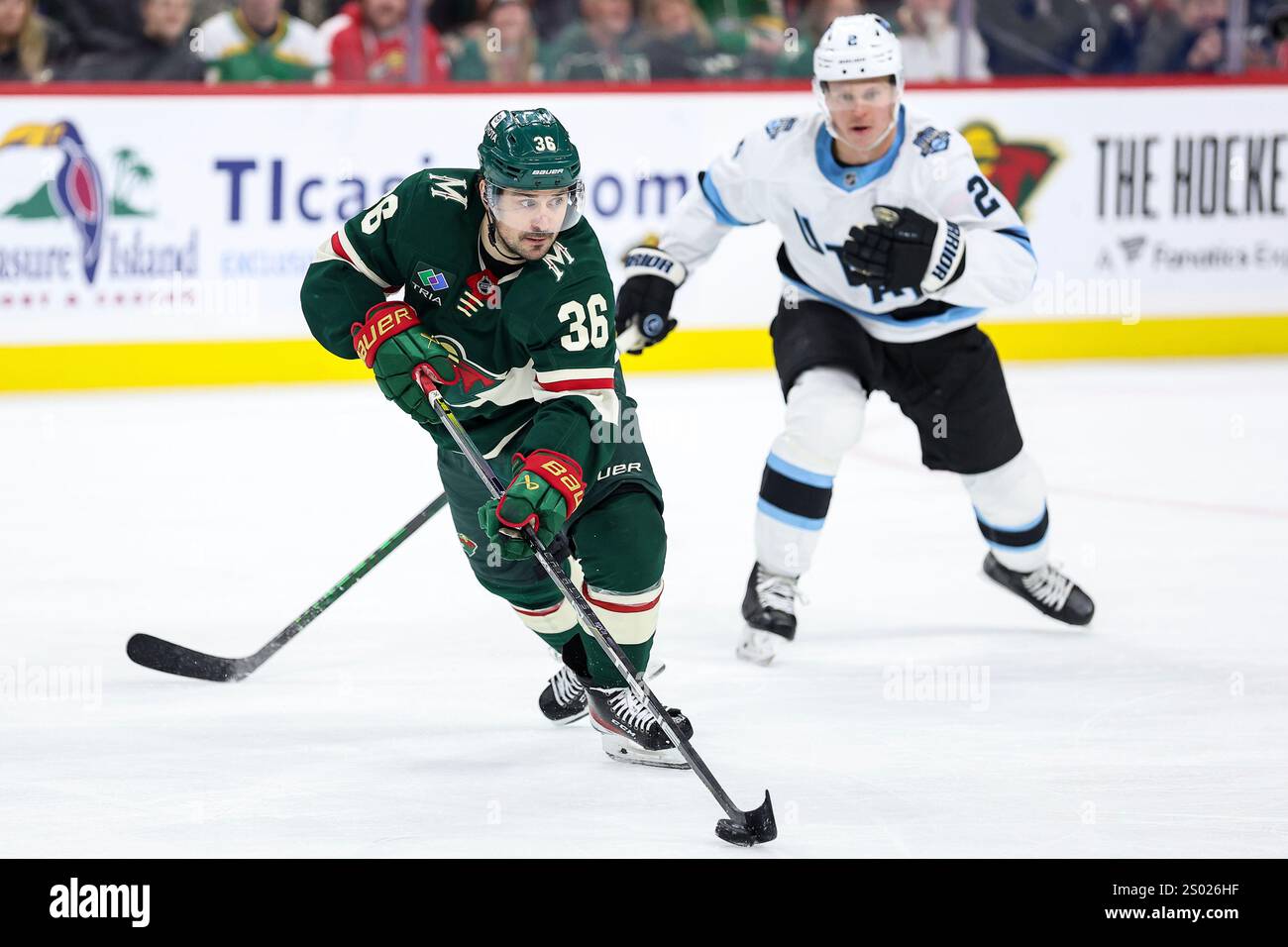 Minnesota Wild right wing Mats Zuccarello (36) skates with the puck ...