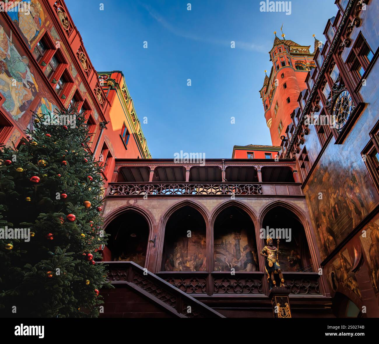 Christmas tree with colorful ornaments stands in the courtyard of ...