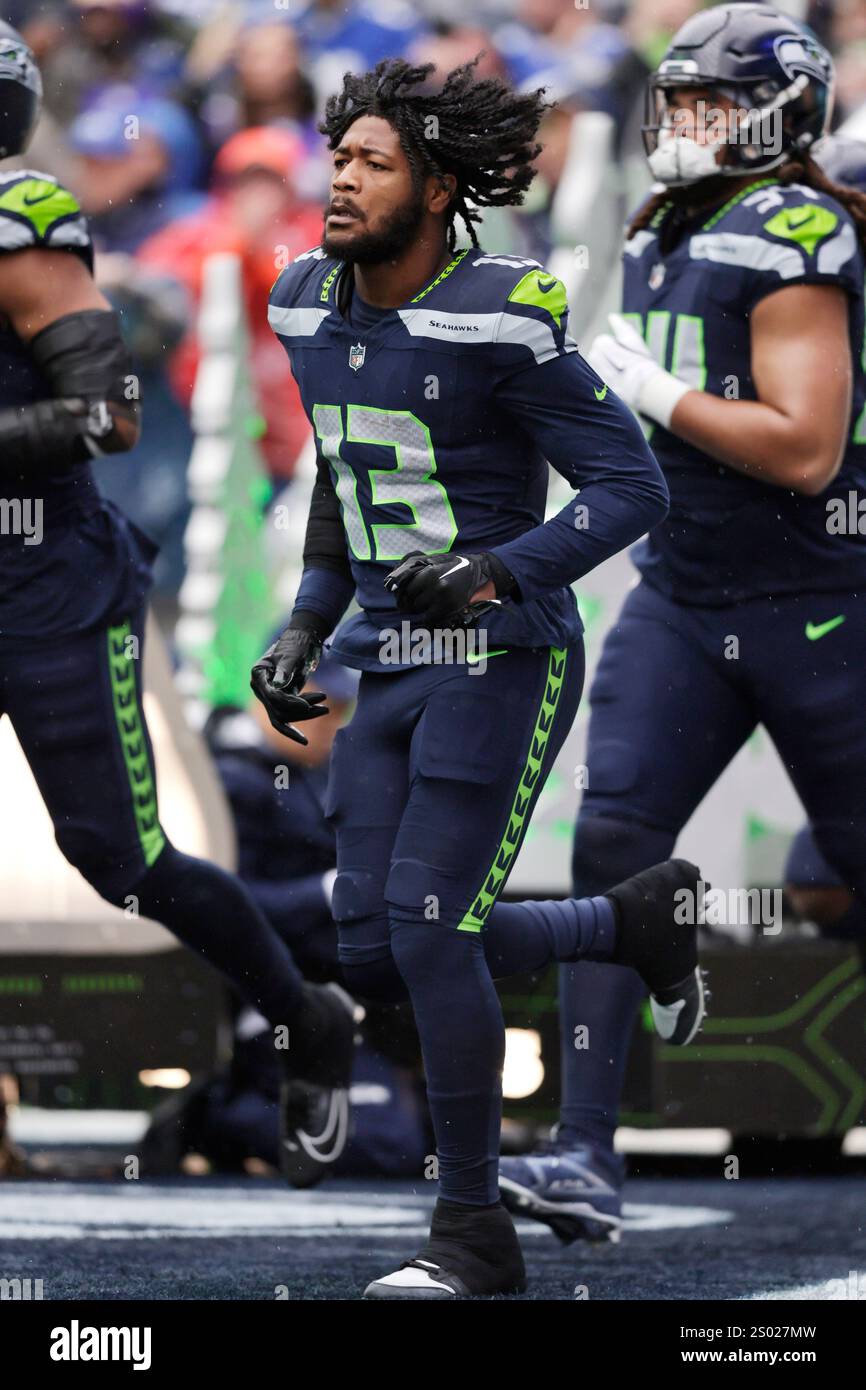 Seattle Seahawks linebacker Ernest Jones IV (13) runs onto the field ...