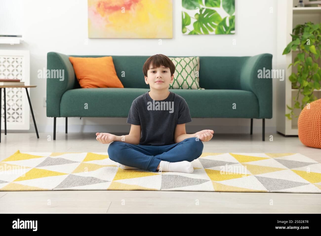 Exercise boy stretching hi-res stock photography and images - Alamy