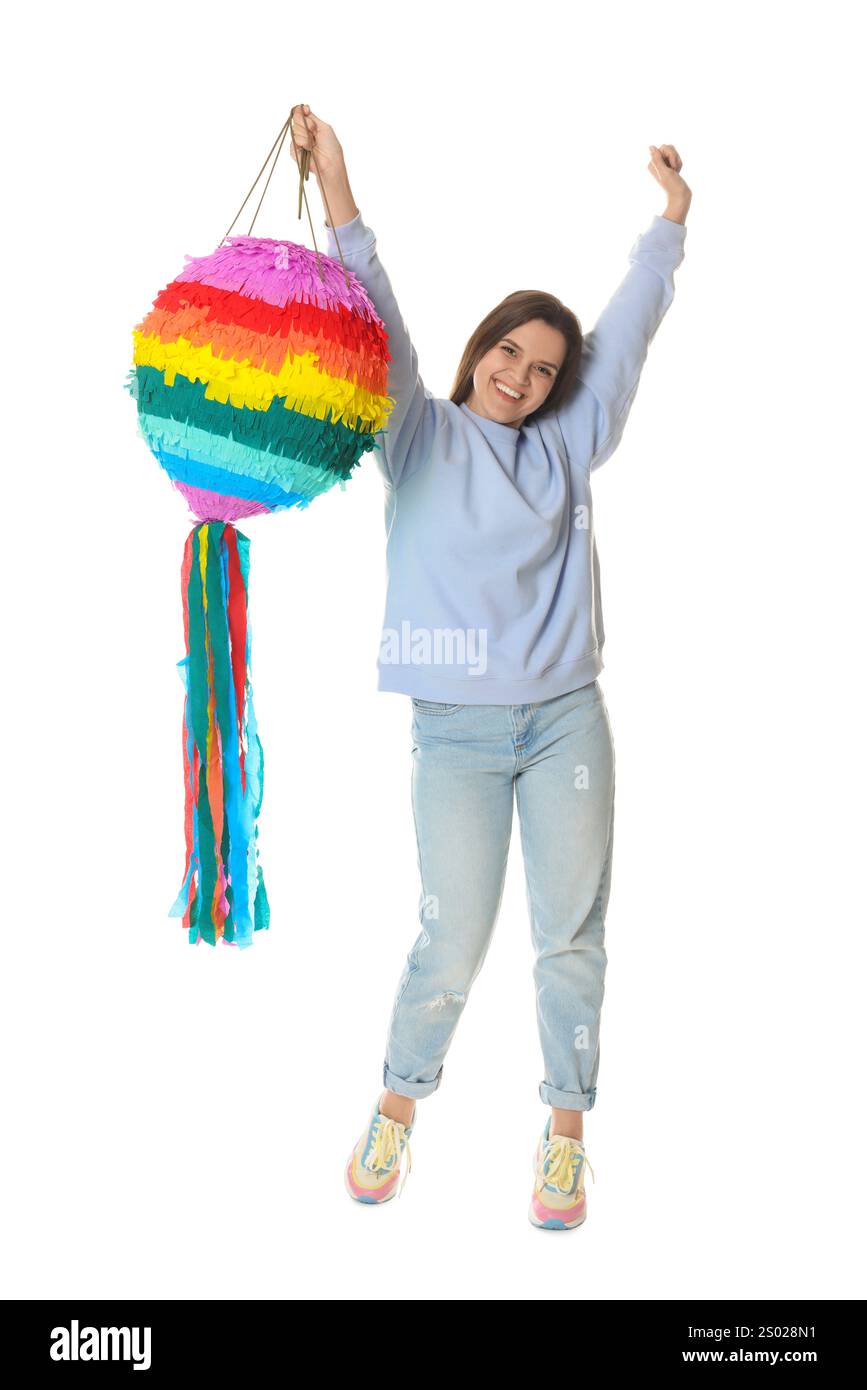Happy woman with colorful pinata and stick on white background Stock ...