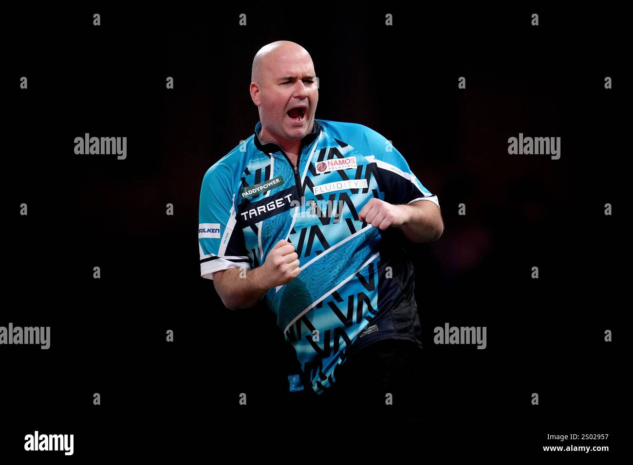 Rob Cross reacts during his match against Scott Williams during day ...